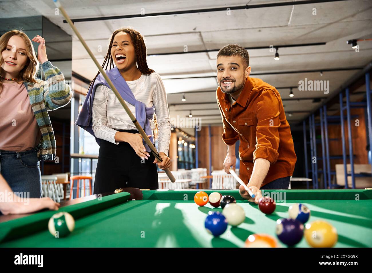 African american woman playing pool hi-res stock photography and images - Alamy