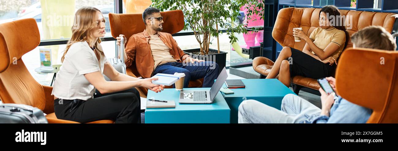 Multicultural colleagues in casual attire sit in chairs in a hotel ...