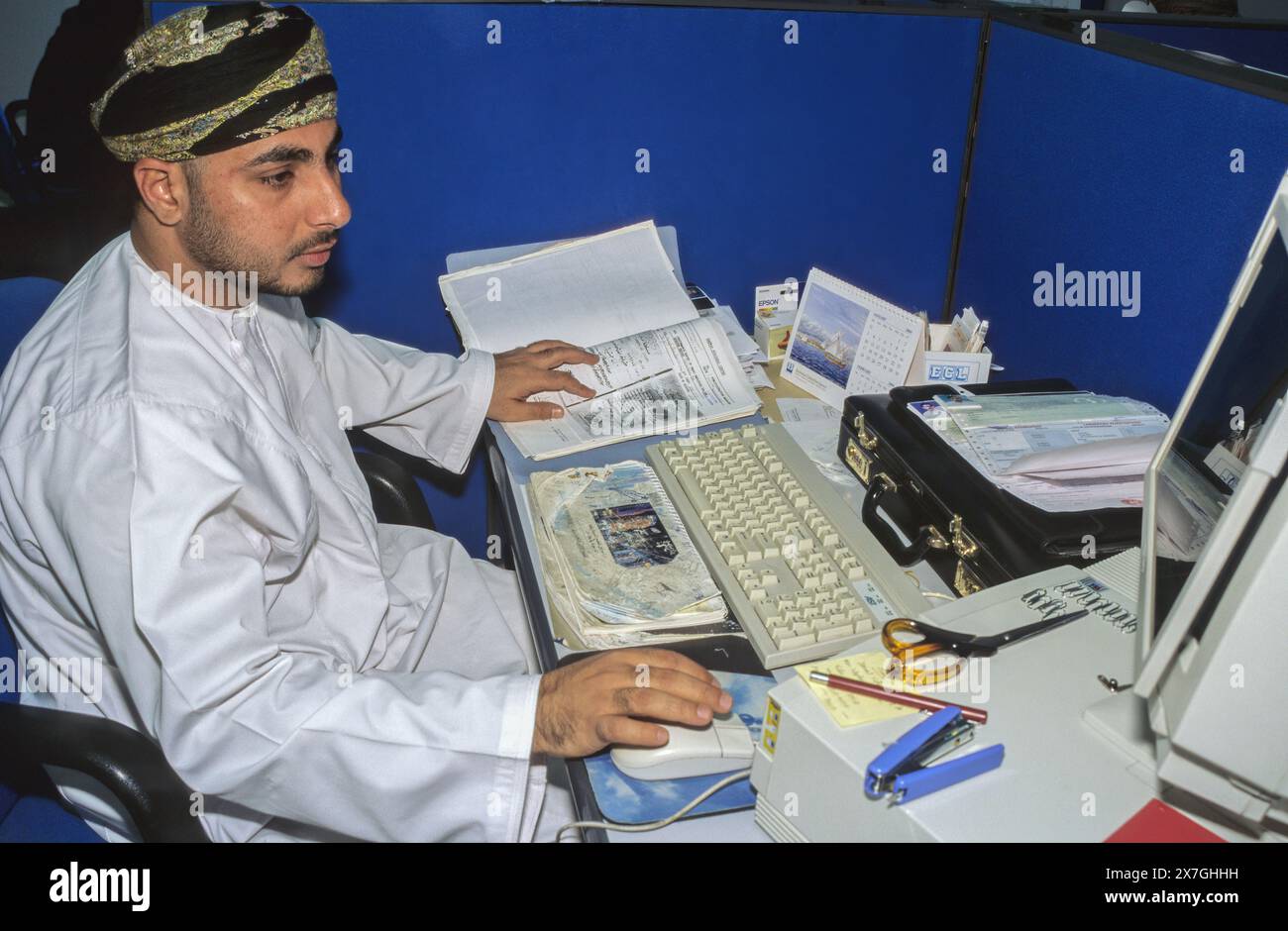Muscat, Oman, Arabian Peninsula, Middle East. Omani Computer Worker ...