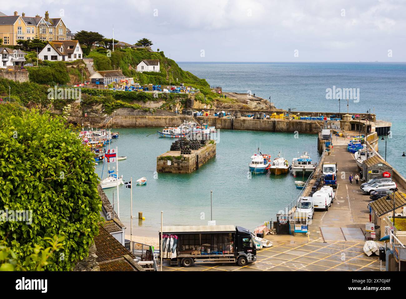 Fishing boats in picturesque Newquay harbour, Cornwall, West Country ...