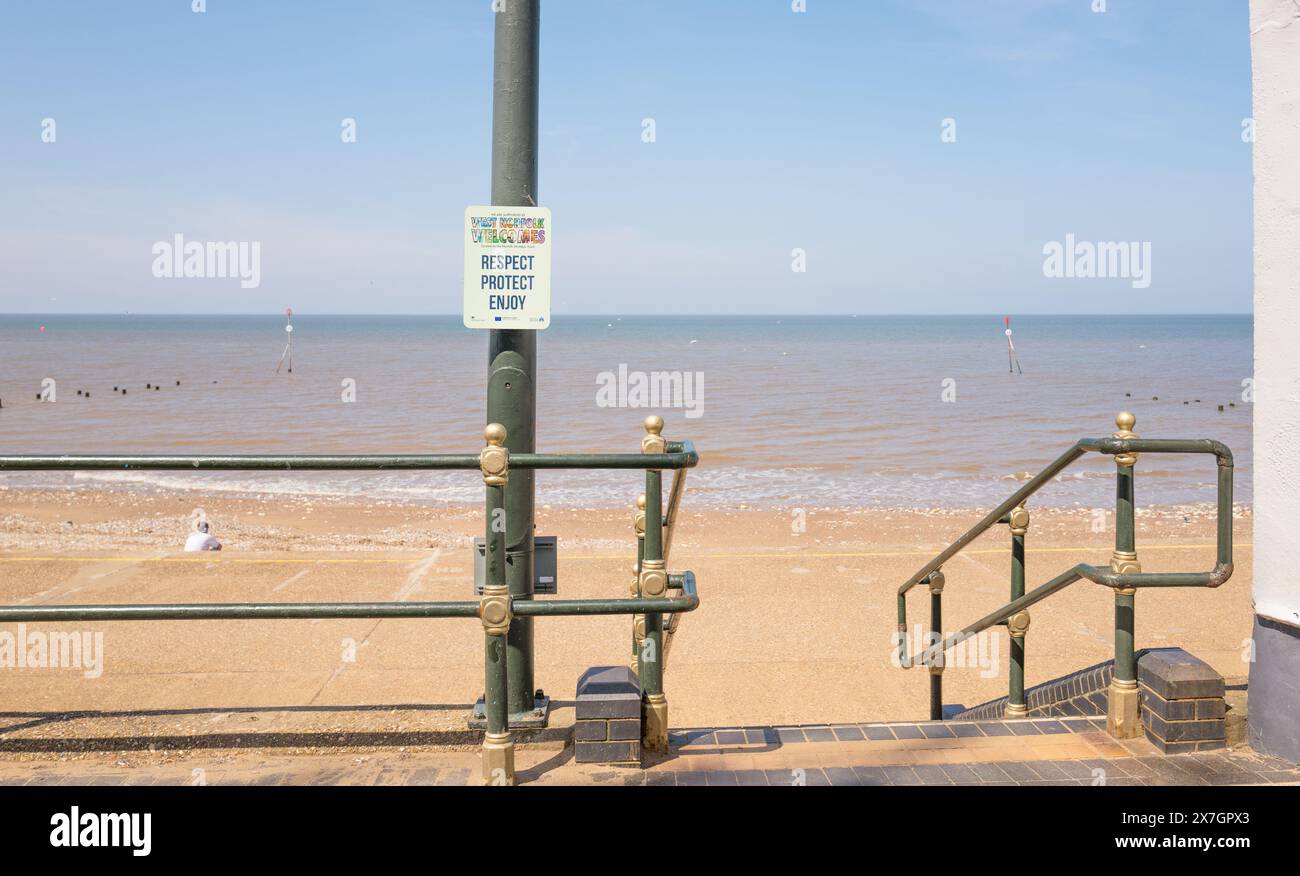 Sign mounted onto a metal light post along the sea wall and promenade ...