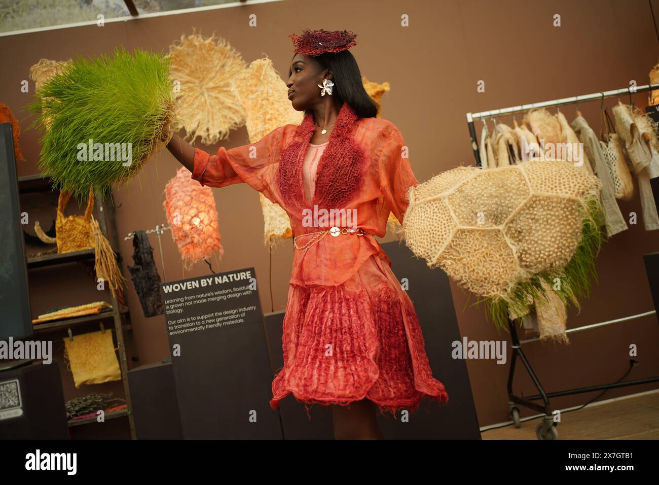 Model Fade Owoaje wearing a Chelsea crimson red dress that has been ...