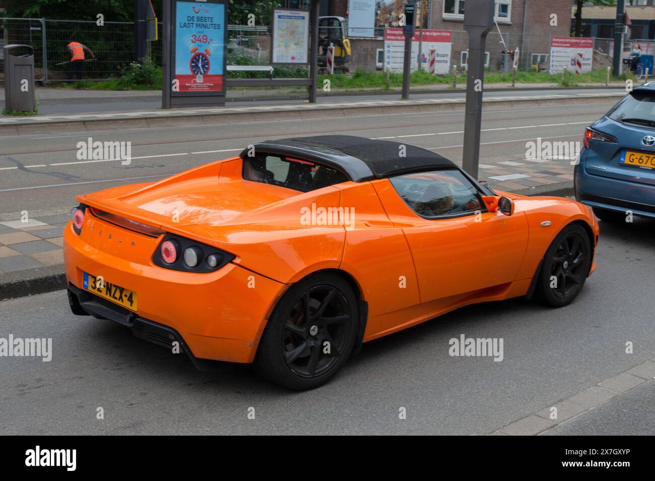 Orange tesla sports car hi-res stock photography and images - Alamy