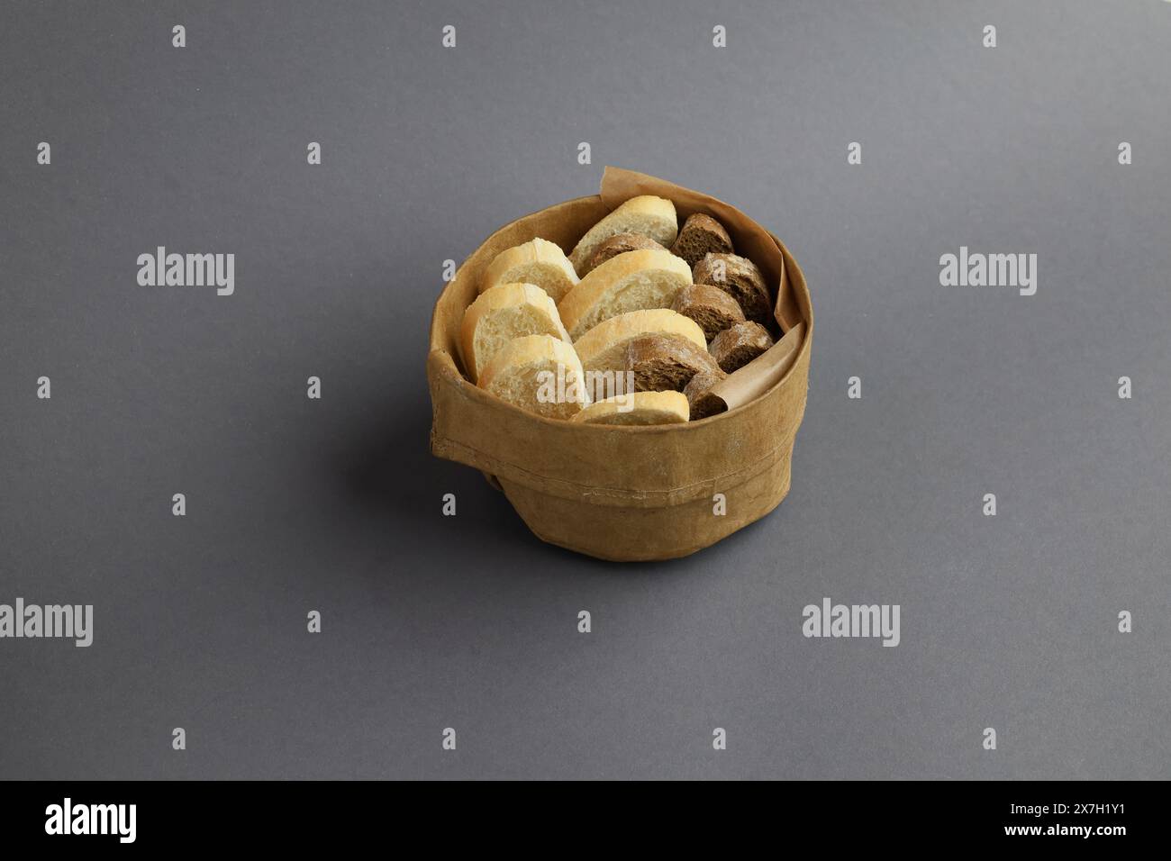 Italian ciabatta bread or bun in a box on the grey background. Freshly ...