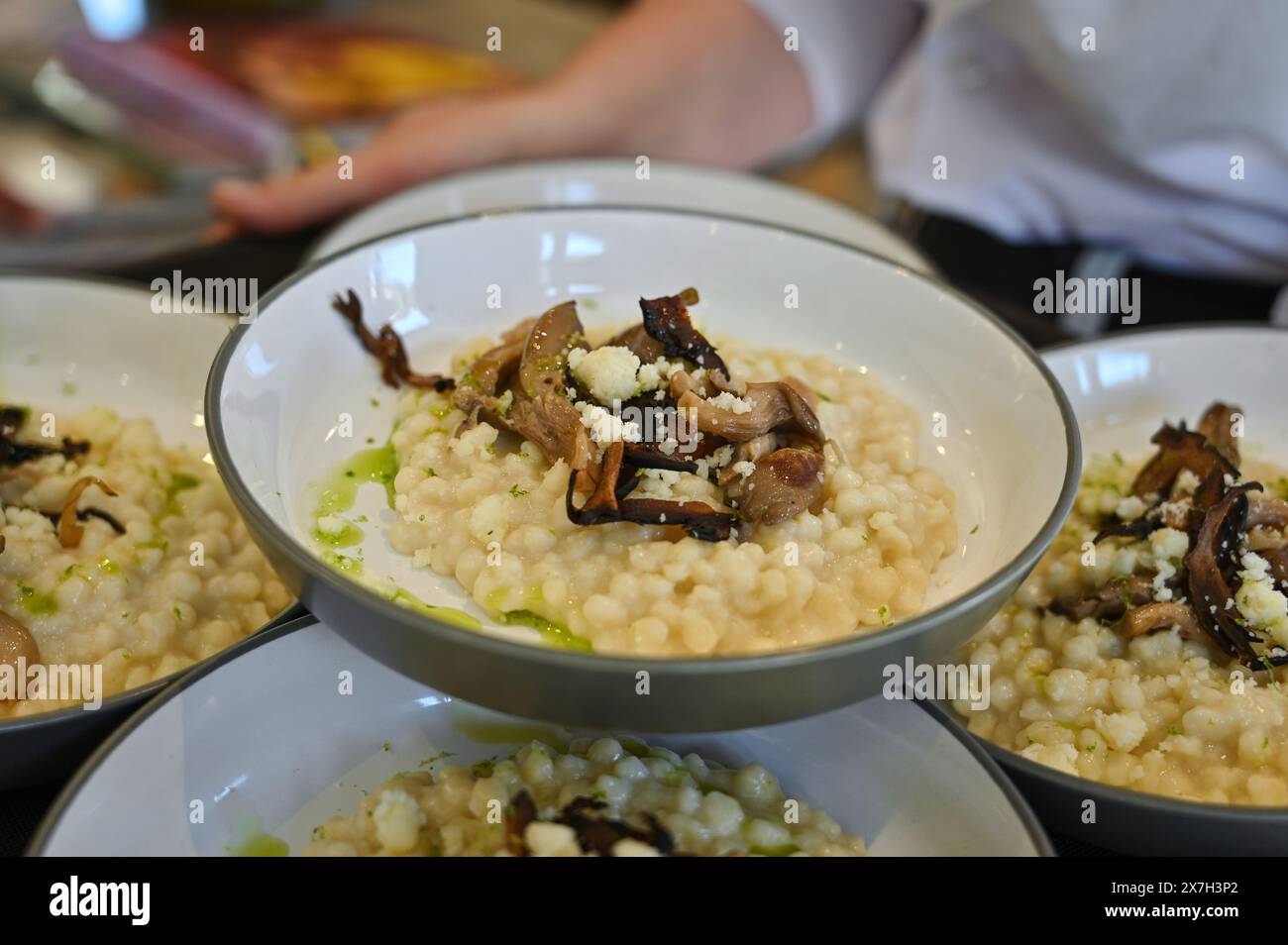 LVIV, UKRAINE - MAY 18, 2024 - Porridge made of millets rolled in eggs ...