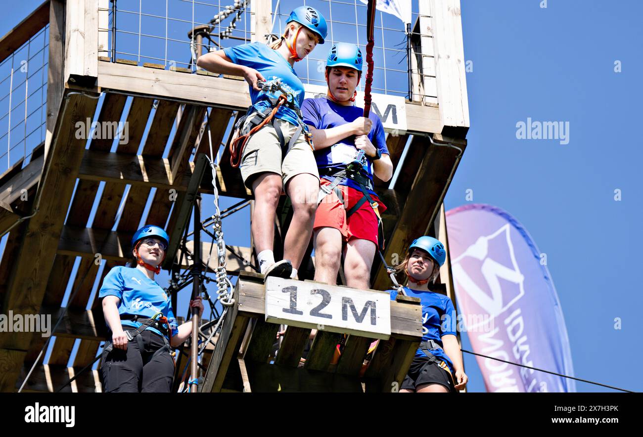 Crown Prince Christian is lowered 12 meters down from a tower before he ...