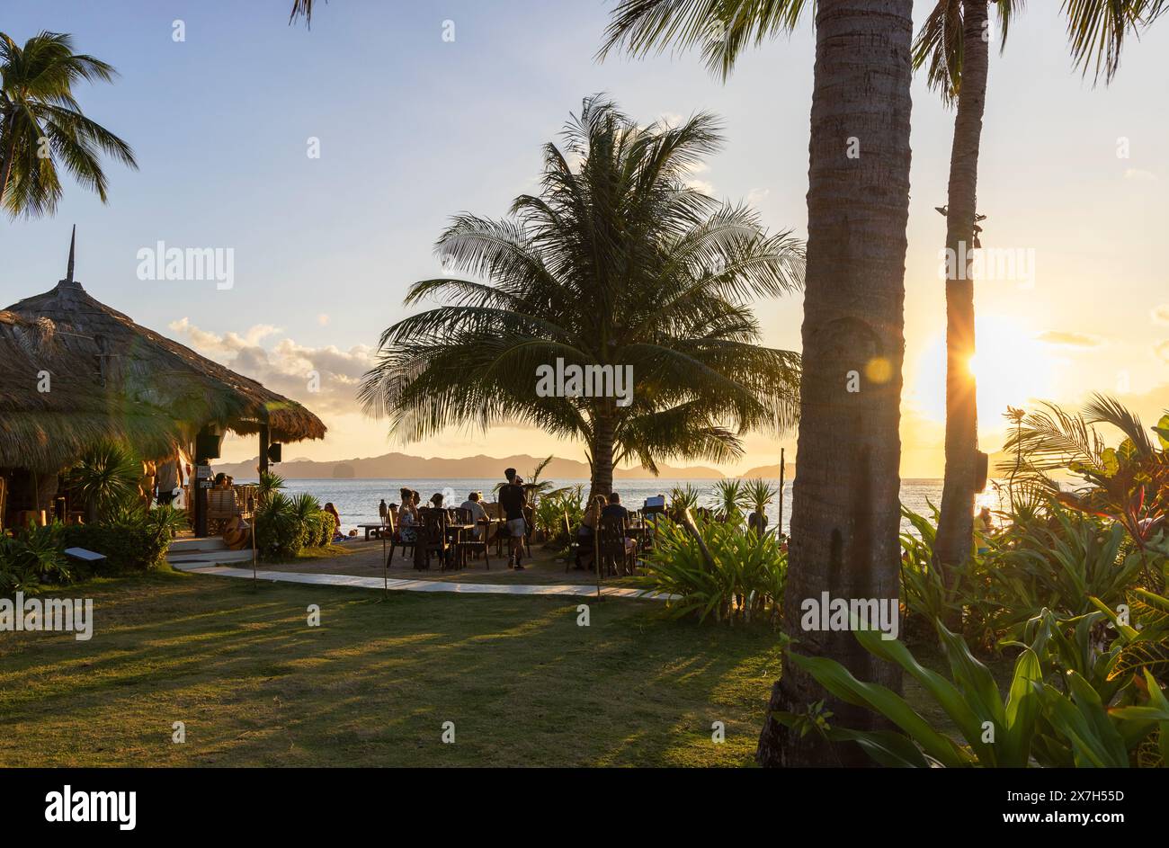 Las Cabanas Beach Resort at sunset, Las Cabanas Beach, El Nido, Bacuit ...