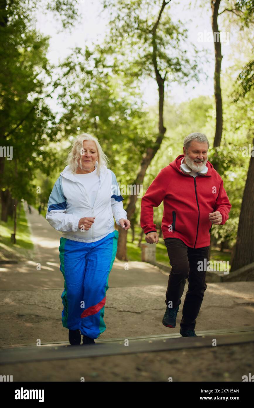 Active senior living, elderly couple, man and woman showing health ...