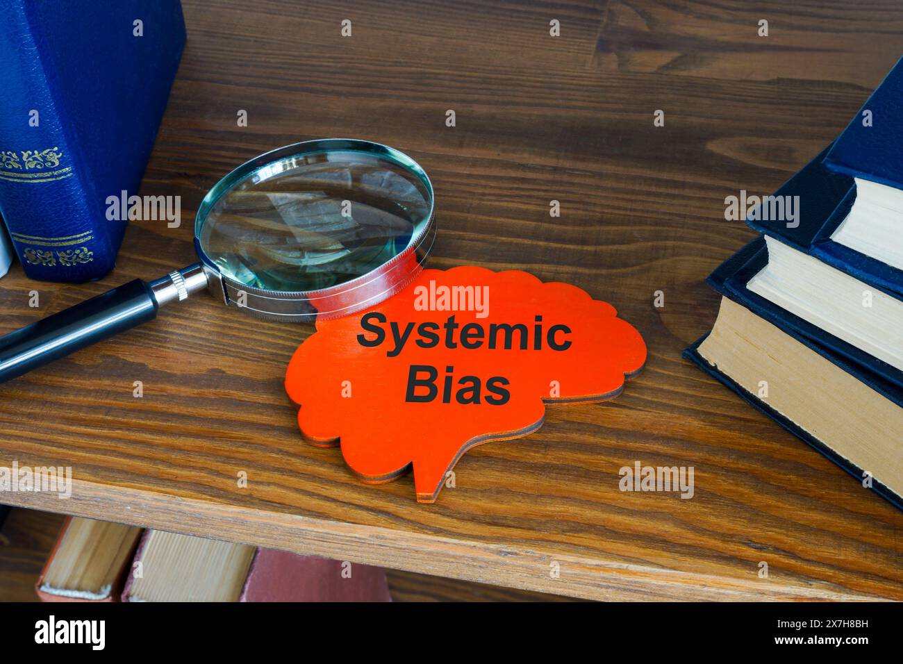 Systematic bias concept. Sign and magnifying glass on the shelf Stock ...