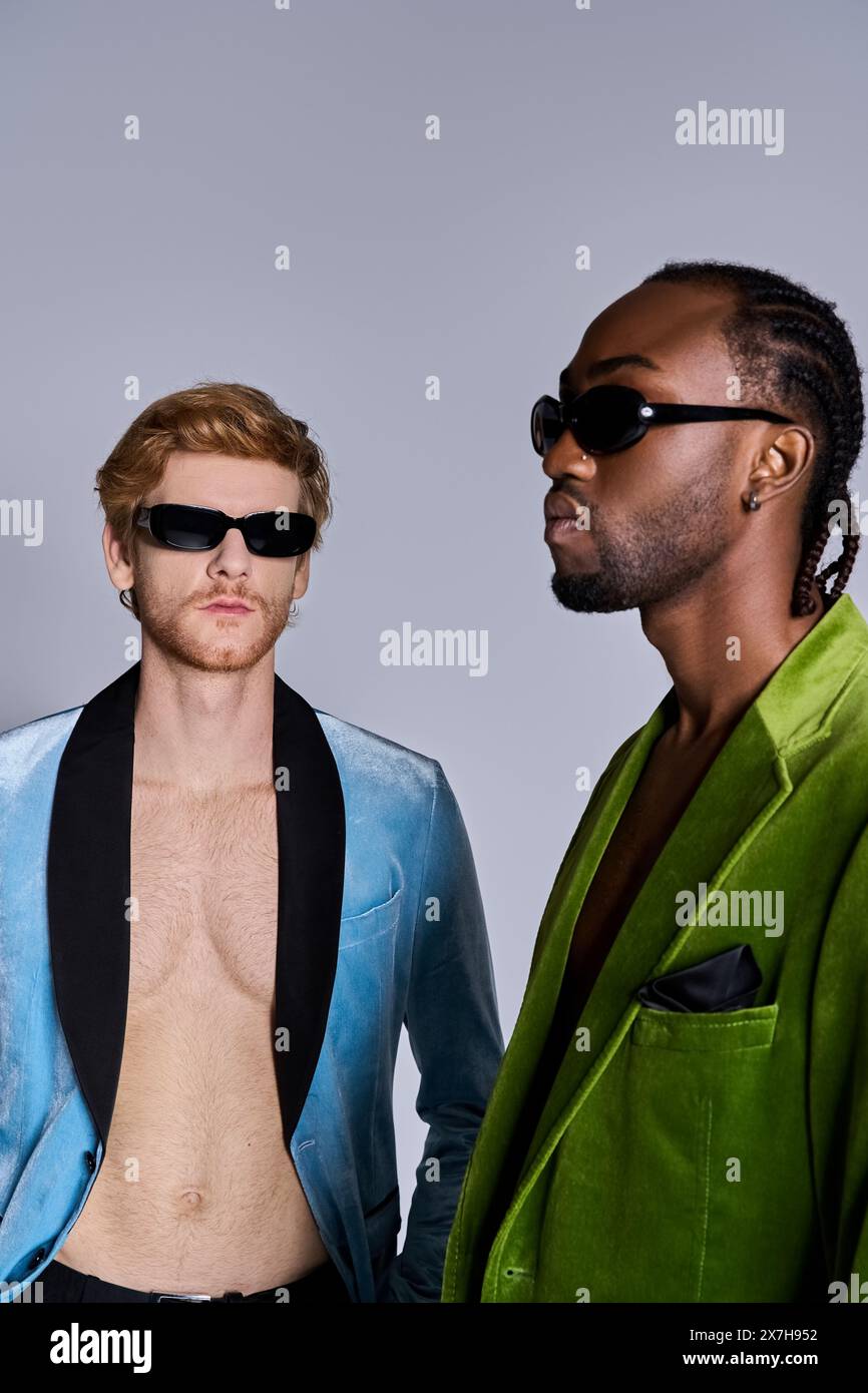 Two men in sunglasses, showcasing their dapper style with a cool and ...