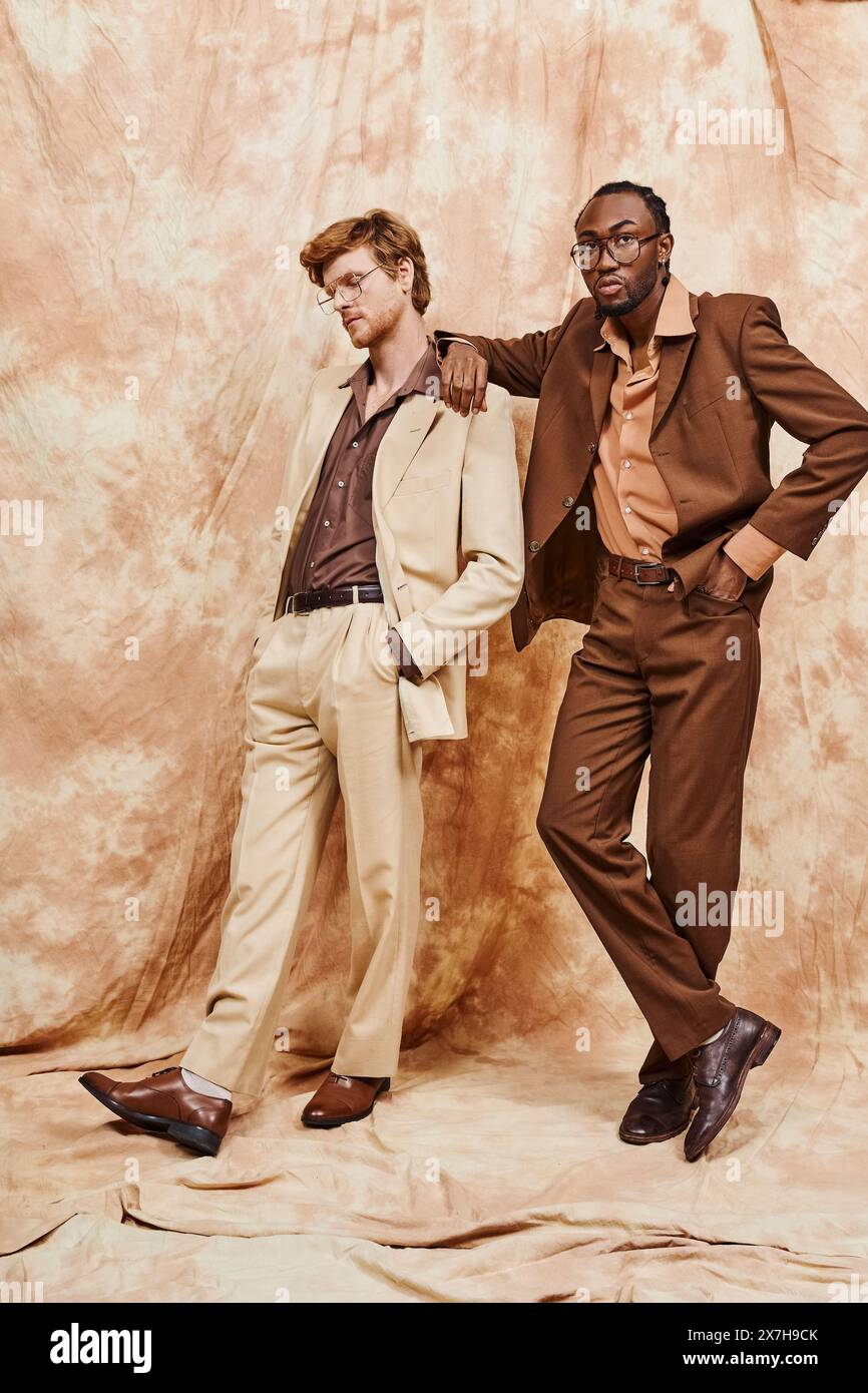 Two multicultural men in elegant suits standing together Stock Photo ...