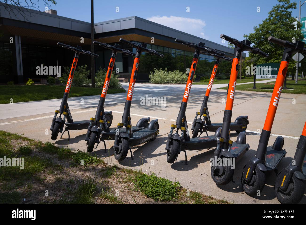 Parked Spin electric scooters on the campus of Michigan State ...