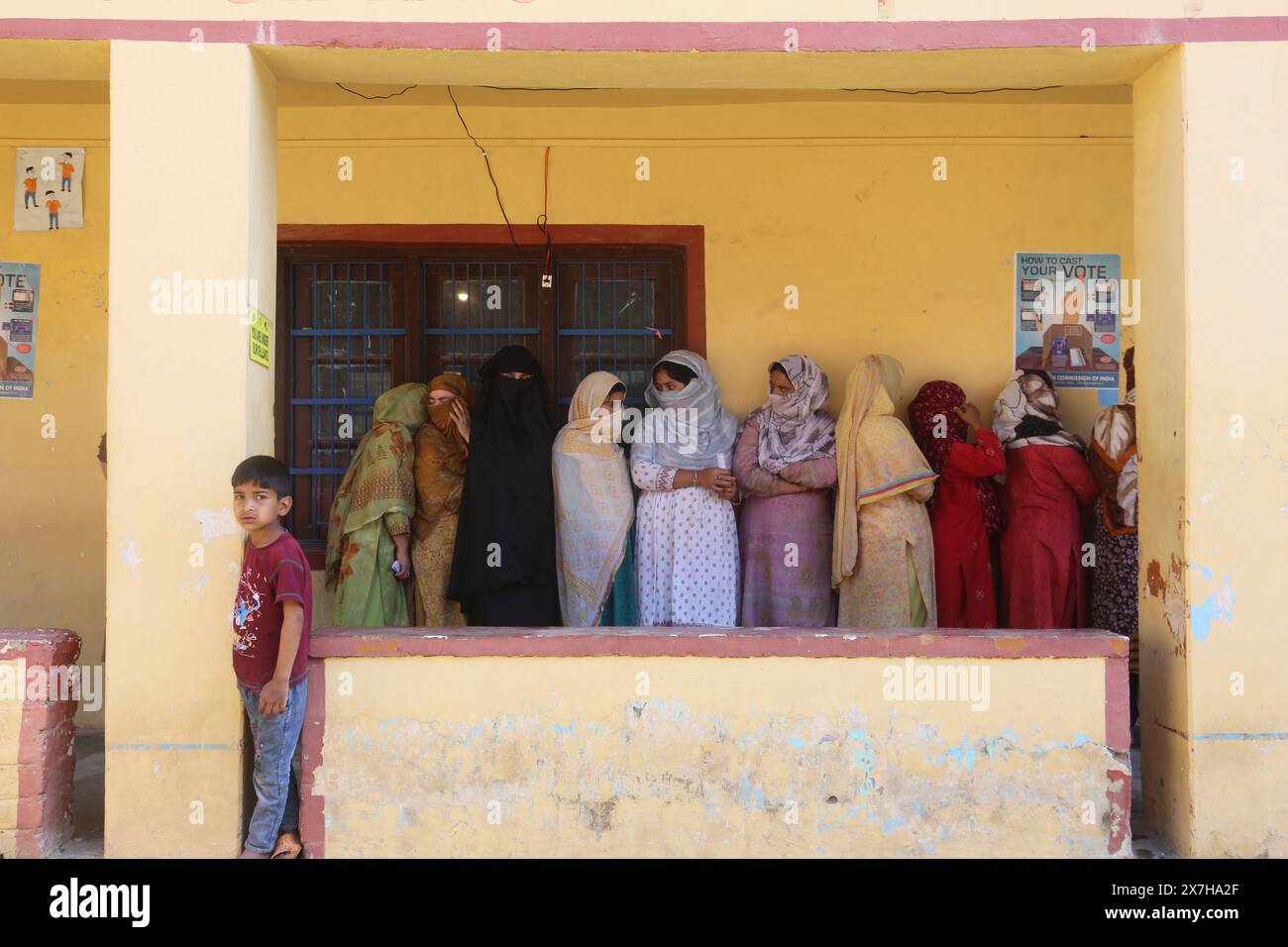 Srinagar, Jammu And Kashmir, India. 20th May, 2024. Voters queue up to ...