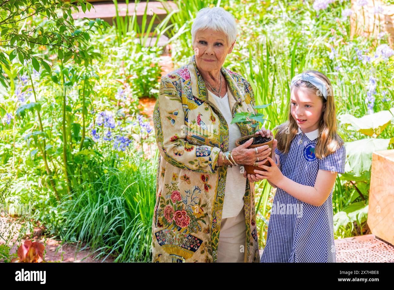 London, UK. 20th May, 2024. Dame Judy Dench s joined by a student ...