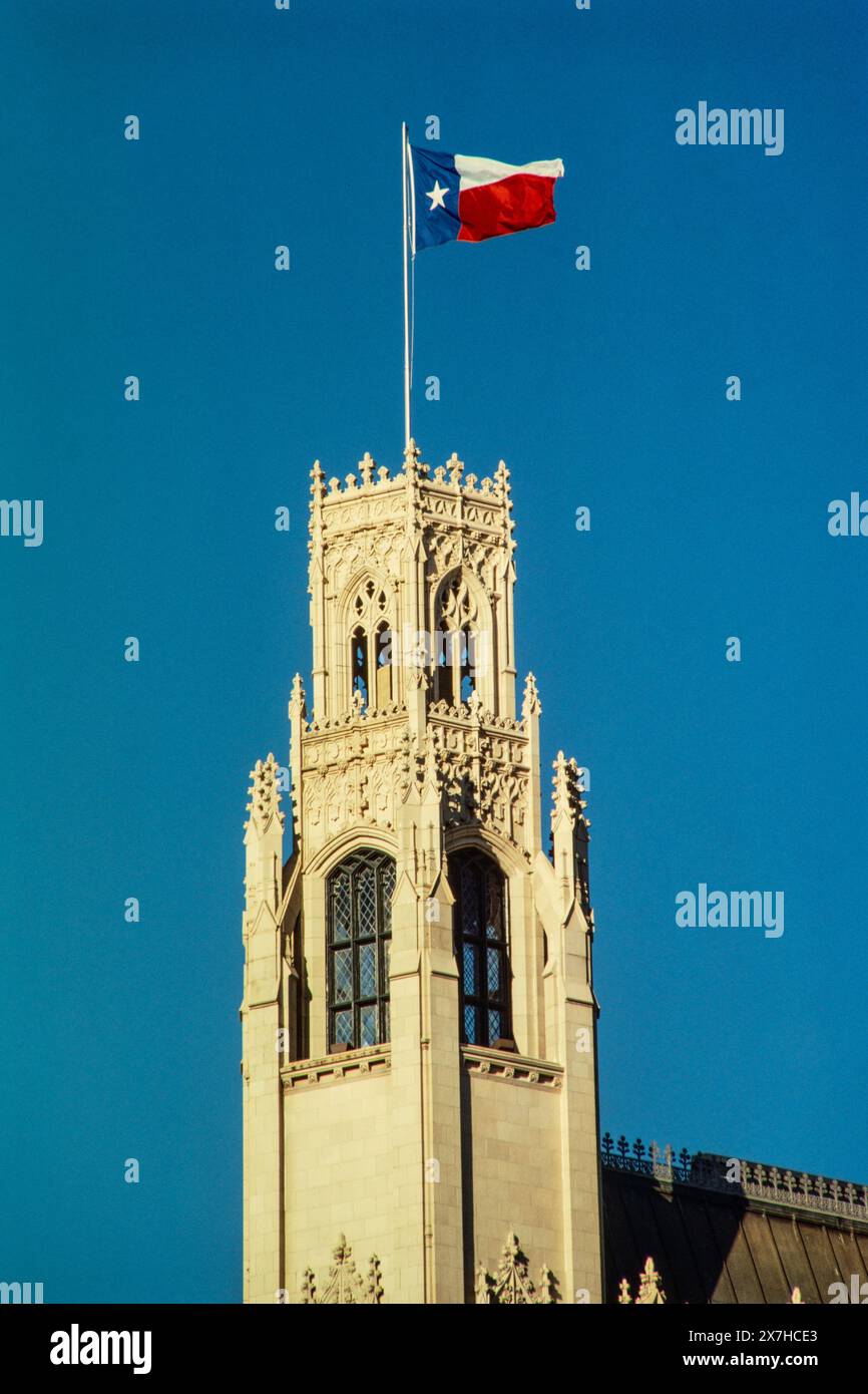 The Texas flag flies over the Gothic Revival Tower of the Emily Morgan ...