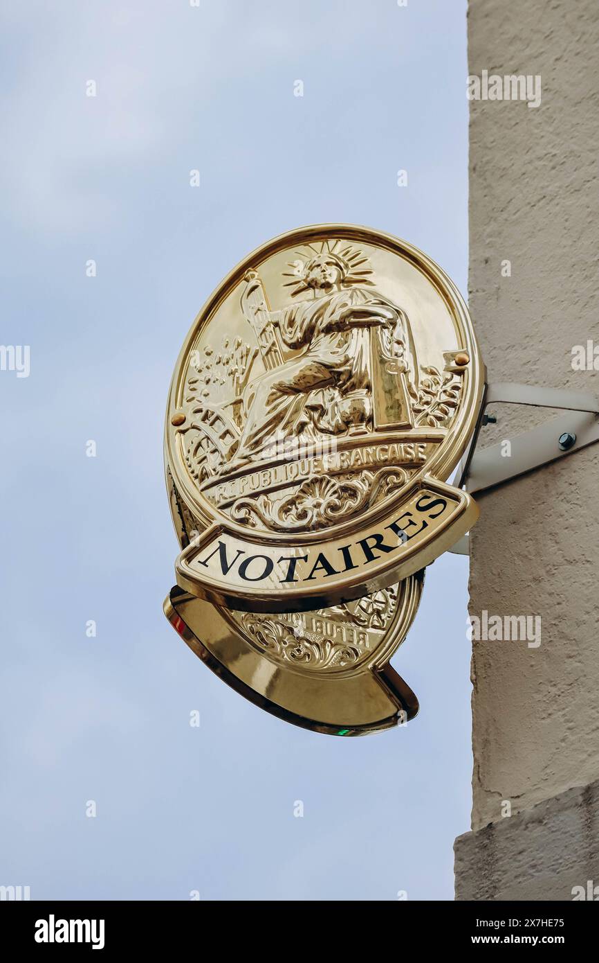 Cannes, France - 30 June 2023 : Notary sign hanging on the facade of a ...