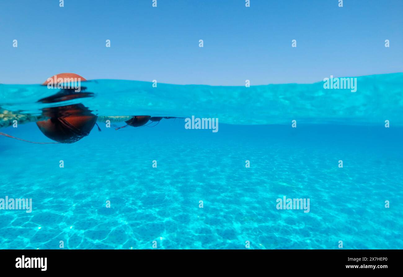 Blue water pool float Underwater split shot photos Stock Photo - Alamy