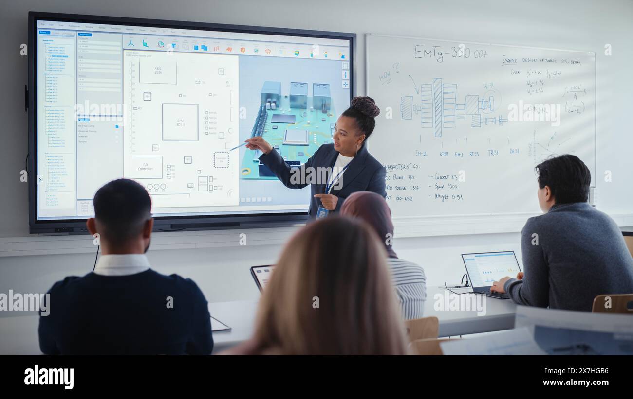 Diverse Team of Computer Design Students Listening to Black Teacher on ...