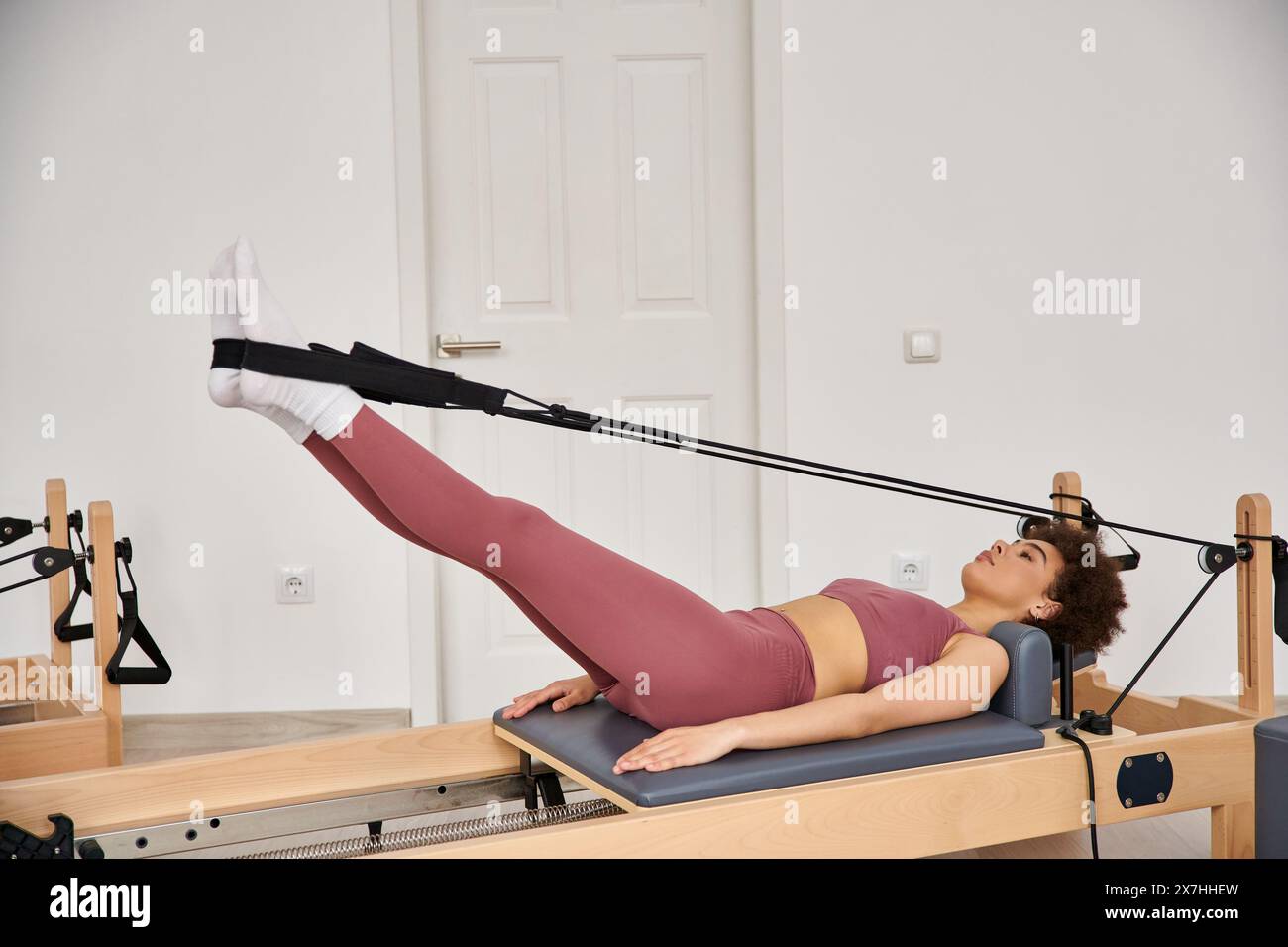 Appealing woman on a pilates lesson Stock Photo - Alamy