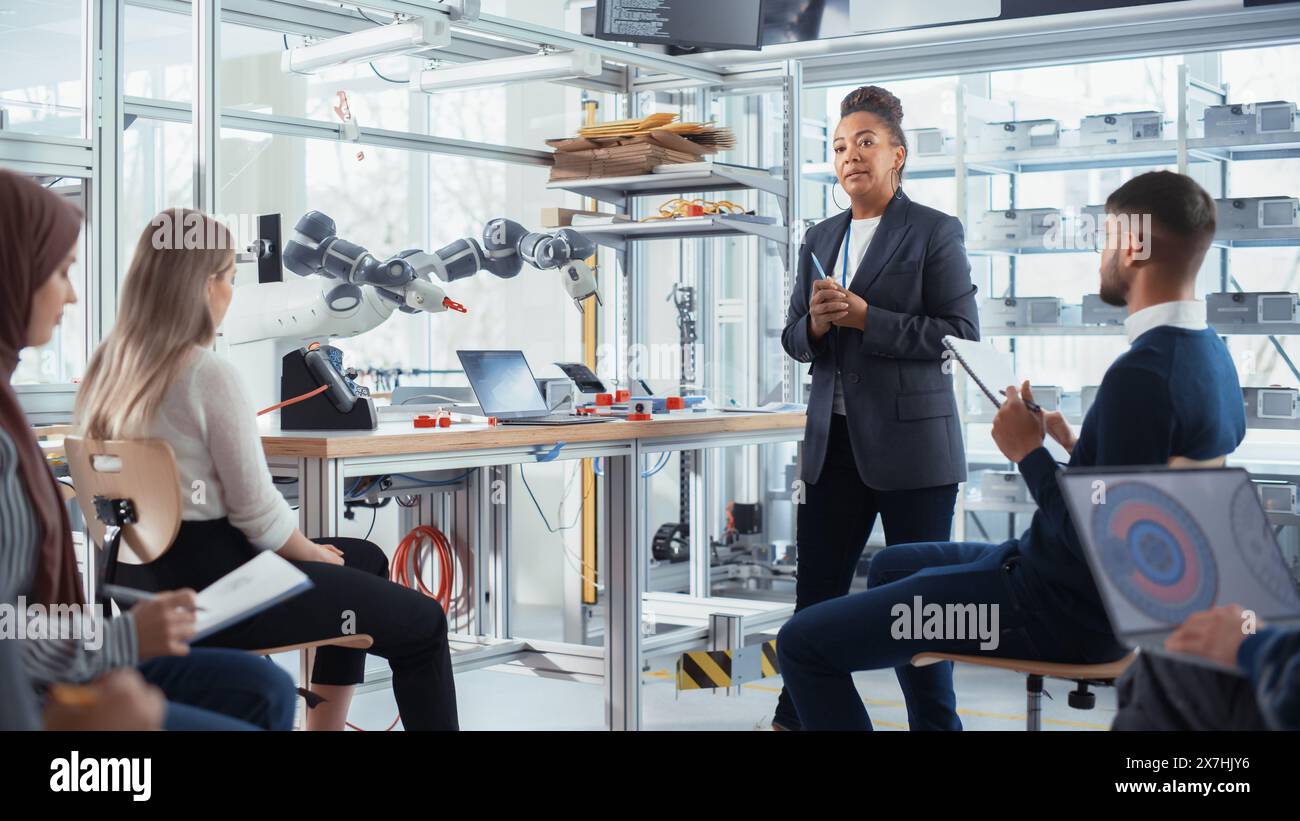 Corporate Meeting Room: Confident Black Female Engineer Talk with Intelligent Future Developers ...