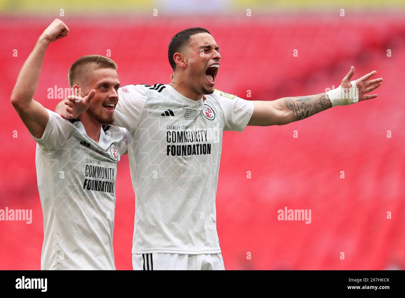 Crawley Town's Klaidi Lolos (right) celebrates after the Sky Bet League ...