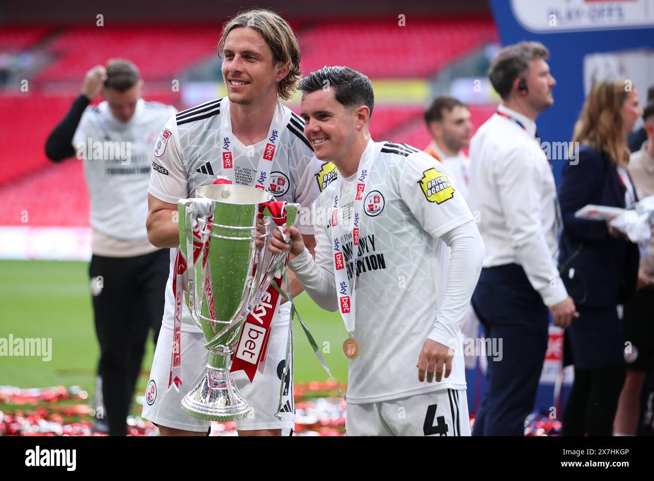 Crawley Town's Danilo Orsi (left) and Liam Kelly pose with the trophy ...