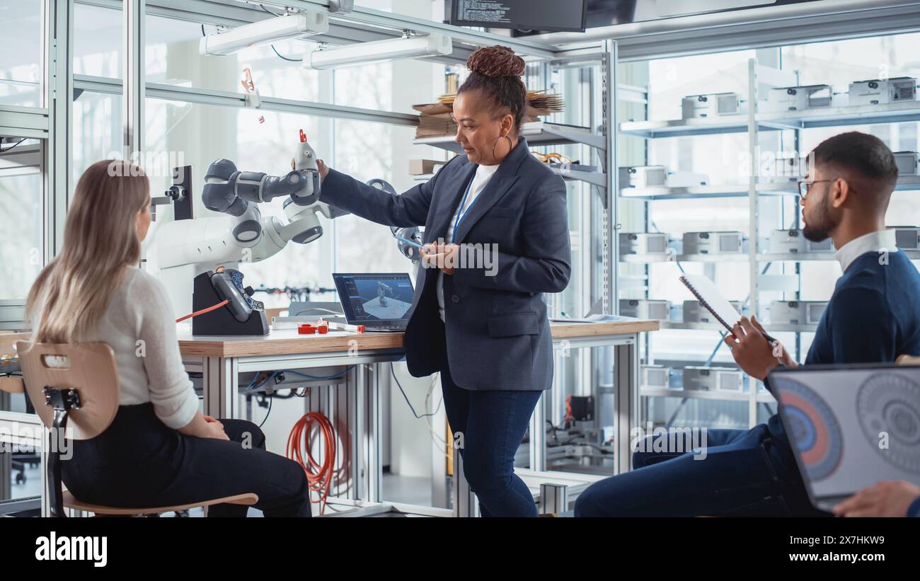Black Senior Engineer Giving Computer Science Lecture to Diverse ...