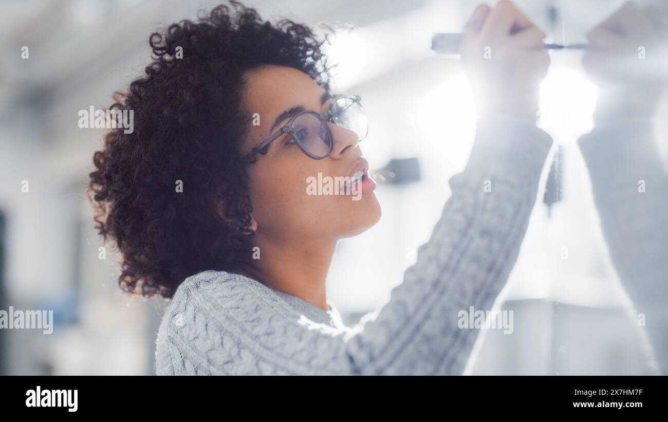 Smart Female Scientist Pondering and Writing Various High School Maths ...