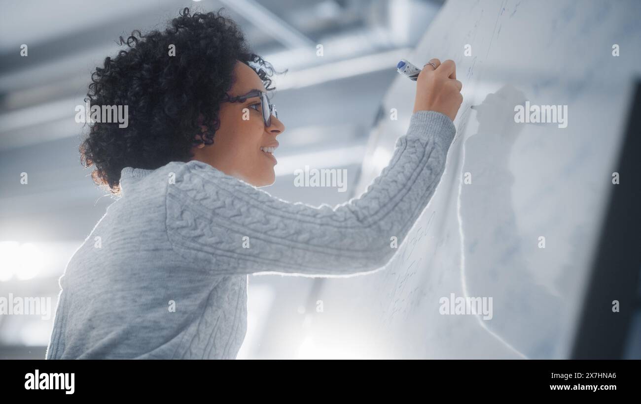 Happy Female Student Thinking about Solving Math Problem With ...