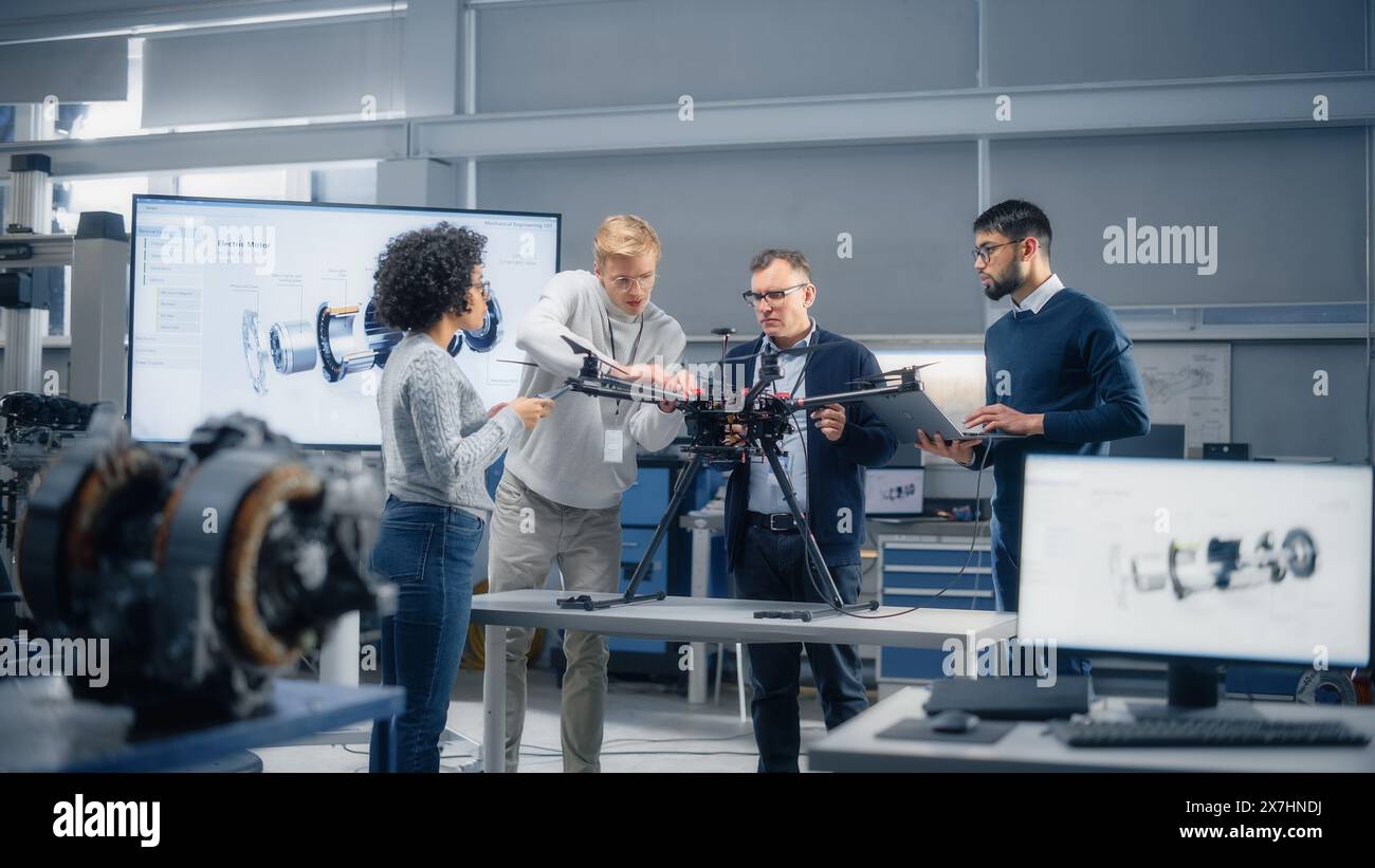 Corporate Meeting Room: Confident Male Engineer Talks with Smart Future Specialists about New ...