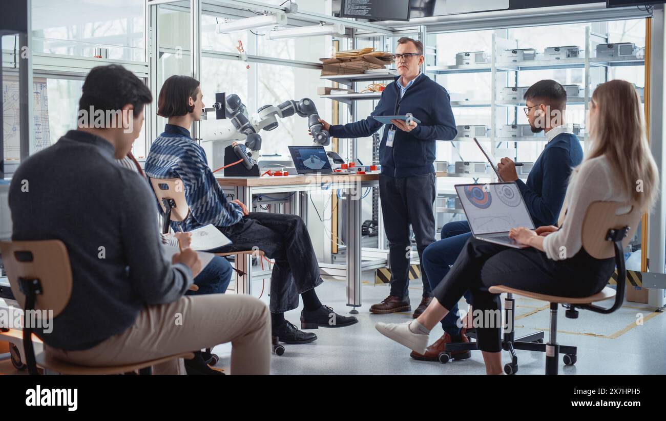University Robotics Class: Teacher Explaining Engineering to Students ... University Robotics Class: Teacher Explaining Engineering to Students ...