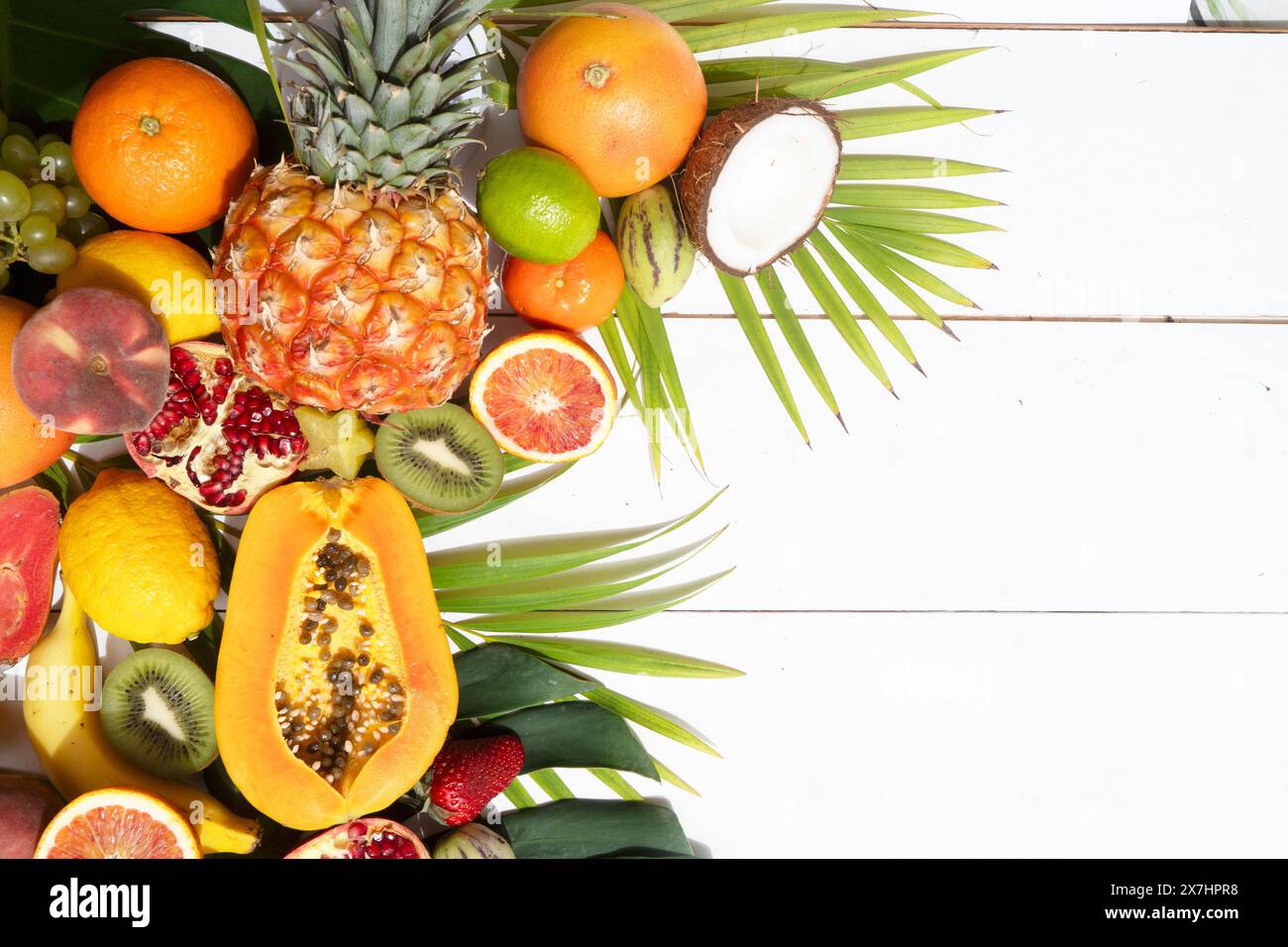 Summer mix of tropical fruits over white Stock Photo - Alamy
