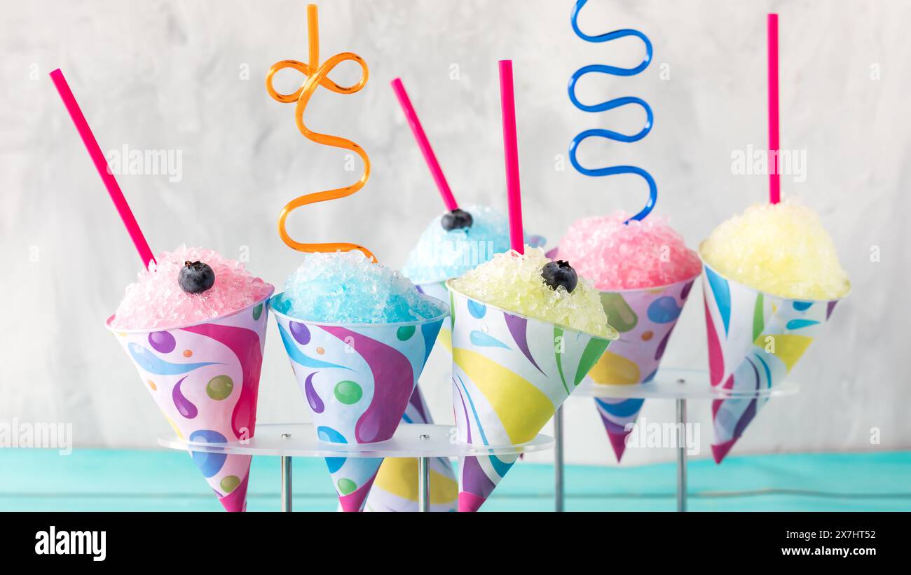 Fruit flavoured snow cones with crazy straws, ready for sharing Stock ...