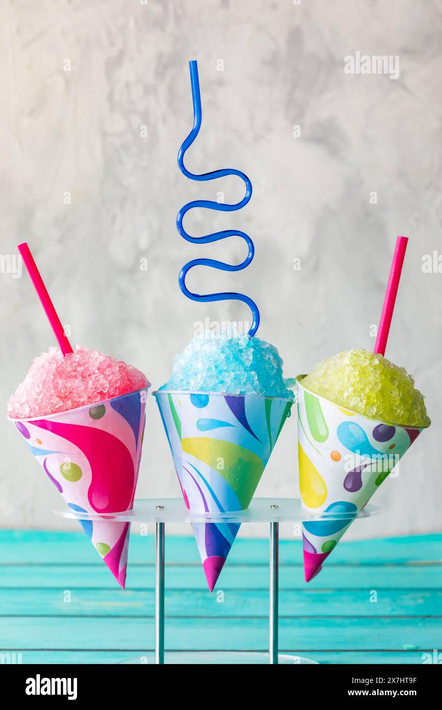 Colourful snow cones in a stand against a light background Stock Photo ...