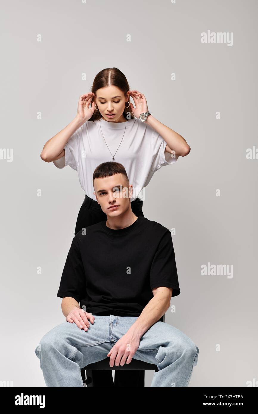 Young man sitting on top of a womans head, showcasing balance and trust ...