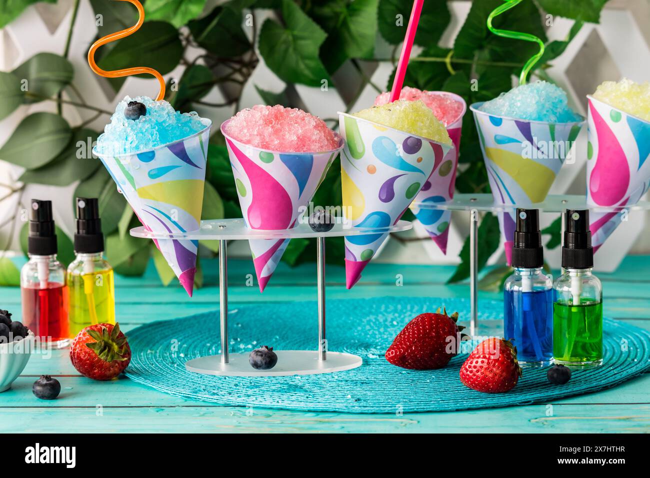 Various colourful snow cones with fruit flavoured syrups Stock Photo ...
