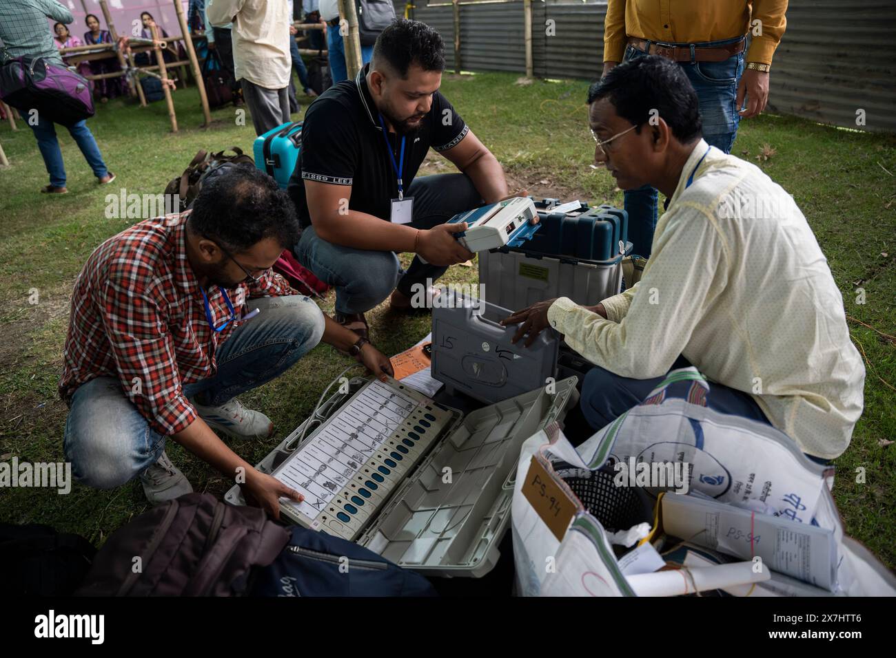 Barpeta, India. 6 May 2024. Polling officials check Electronic Voting ...
