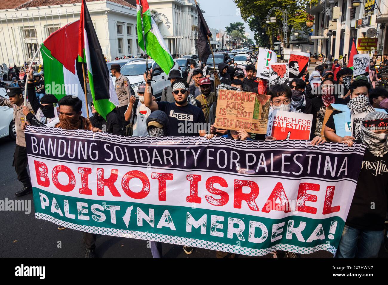 Pro-Palestine protesters walk a long march to commemorate the 76th ...