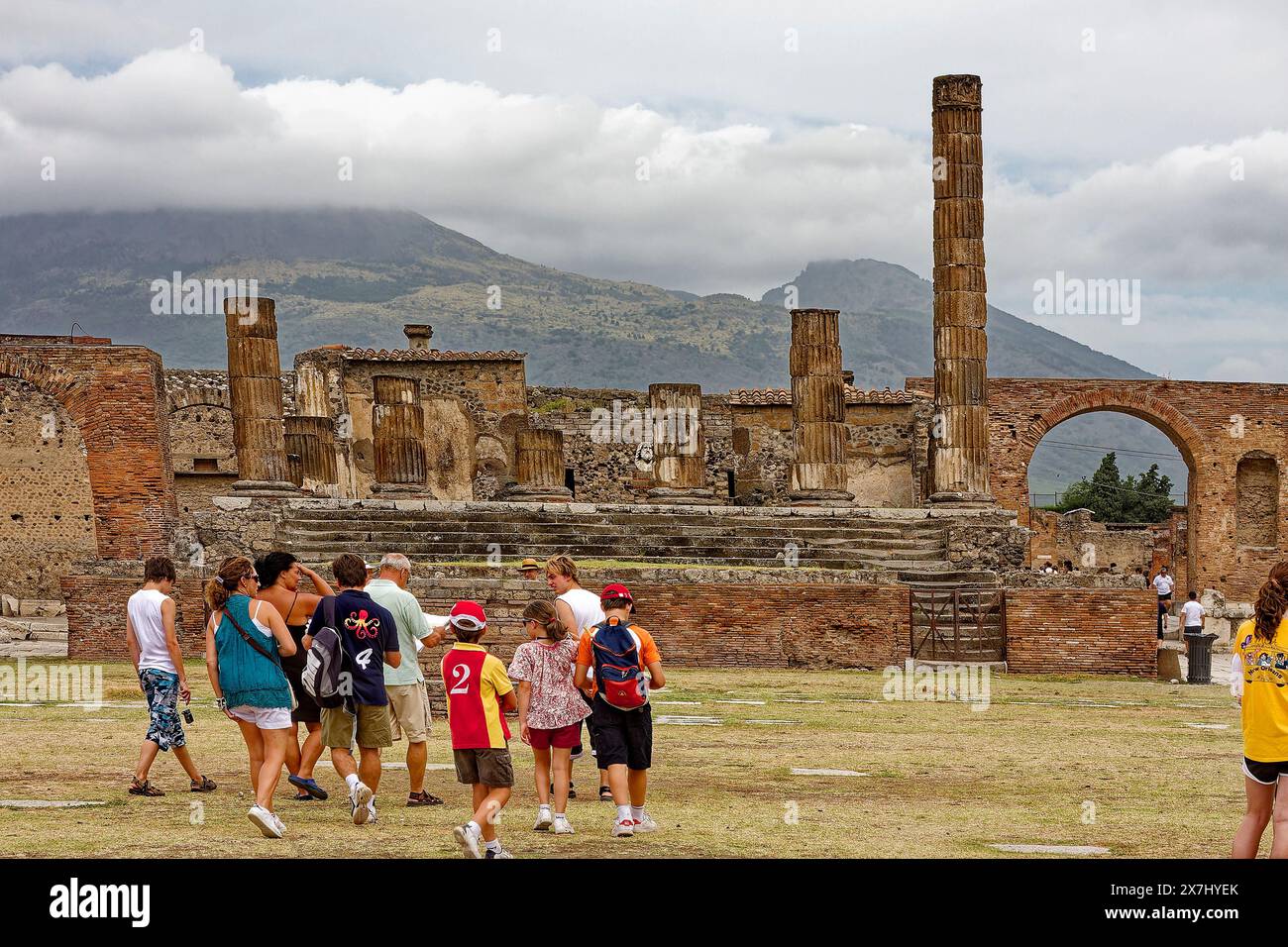 ruins of Pompeii; Forum; tourists; people; family group; Mount Vesuvius ...