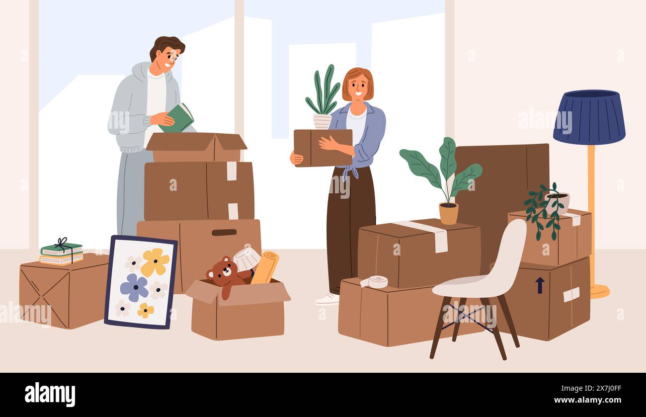 Young happy couple is preparing to move. Packing apartment things ...