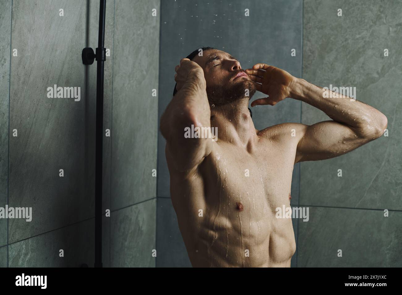 Man taking a shower during morning routine Stock Photo - Alamy