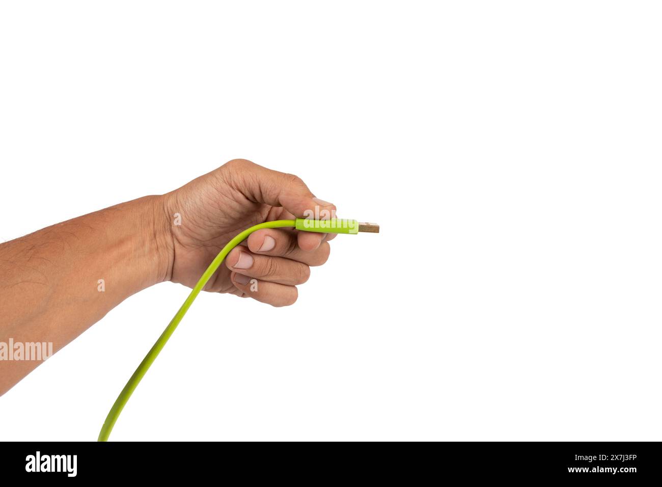Black male hand holding a green USB cable isolated on white background ...