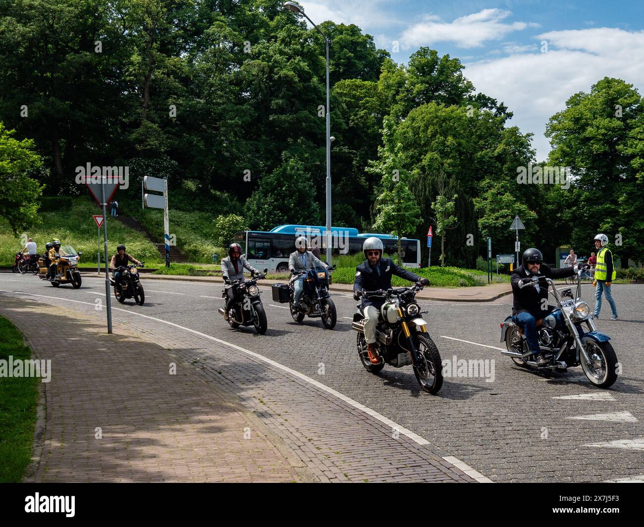 People ride vintage motorbikes. The Distinguished Gentleman's Ride ...