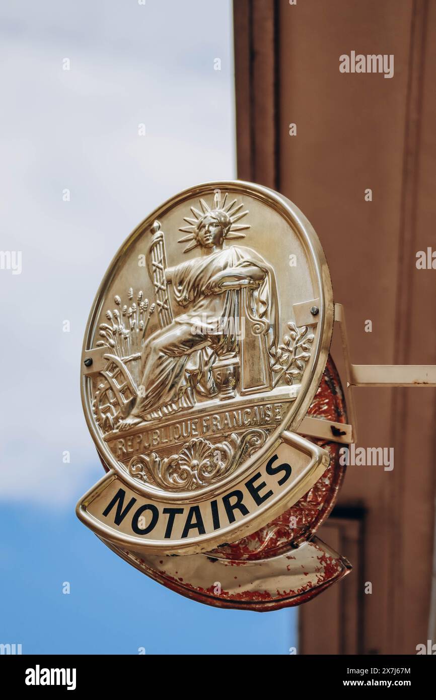 Nice, France - 15 June 2023: Notary sign hanging on the facade of a ...