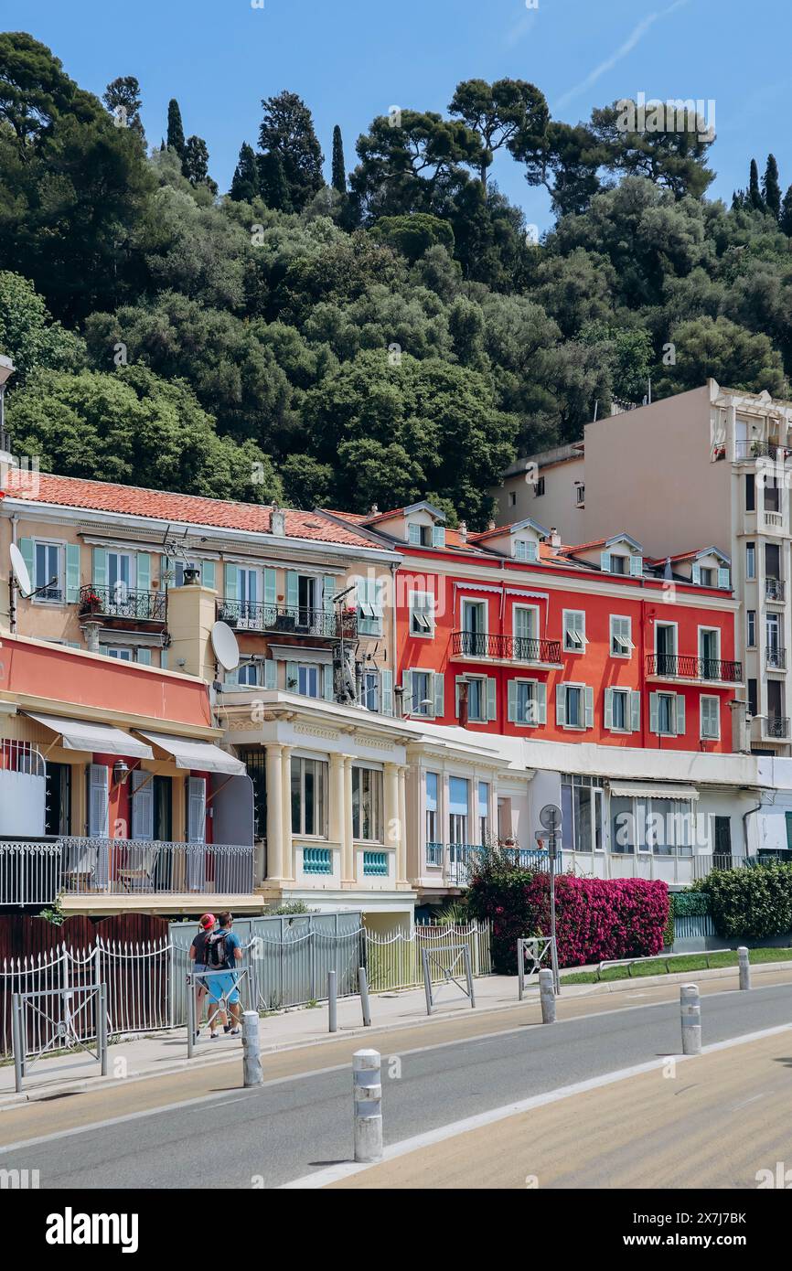 Nice, France - 01 June 2023: Bright red southern facades of Nice and ...