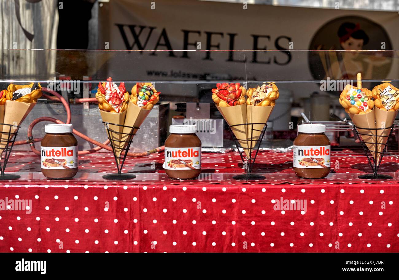 Waffles and Nutella spread for sale at a street market stall. England ...