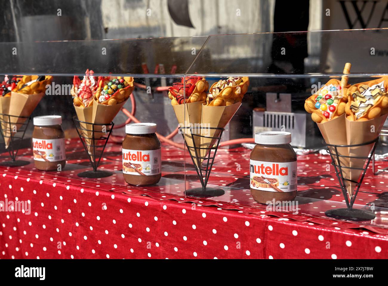 Waffles and Nutella spread for sale at a street market stall. England ...