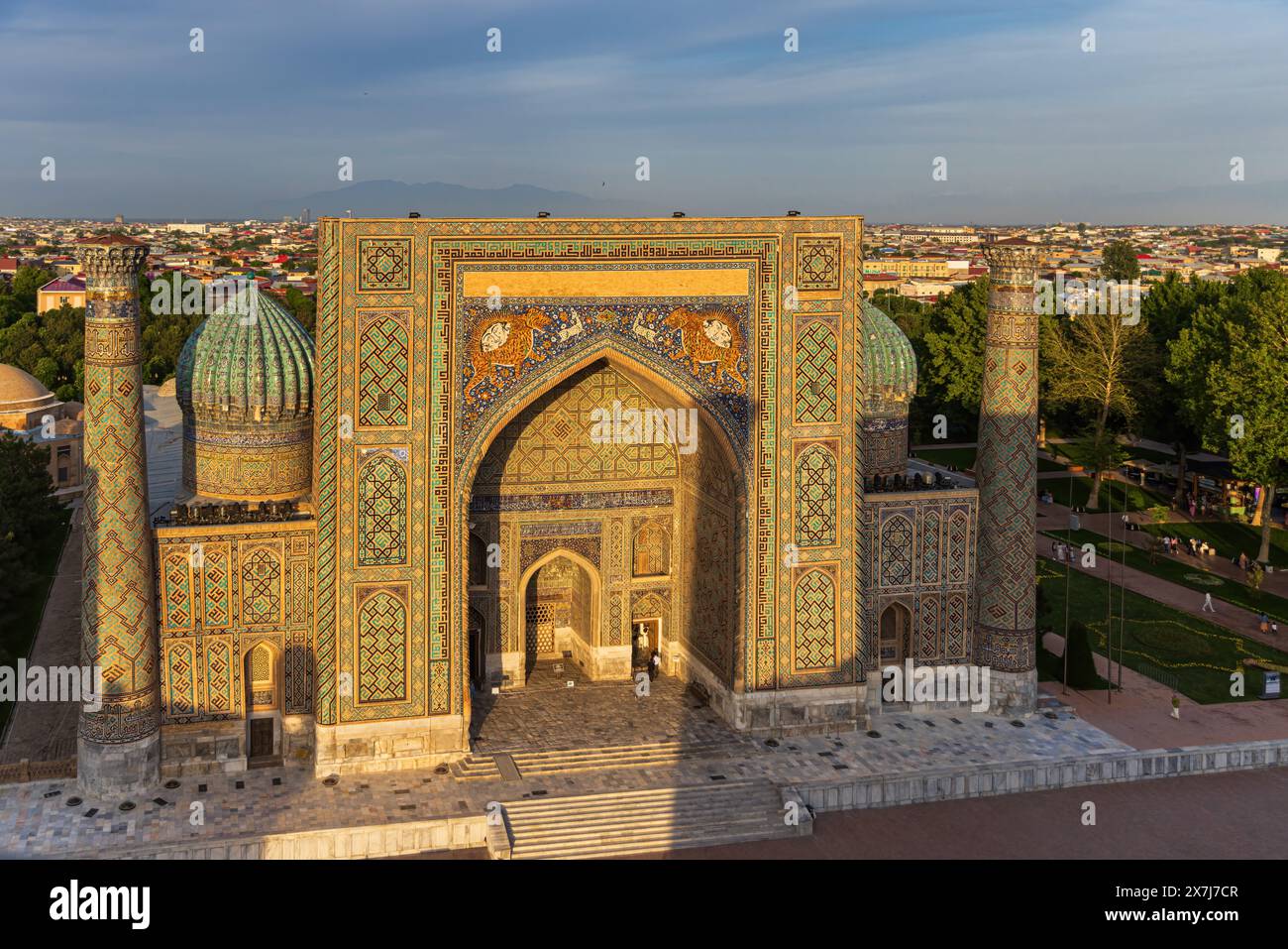 Registan Sher Dor Madrasa in an aerial view at sunset in Samarkand ...