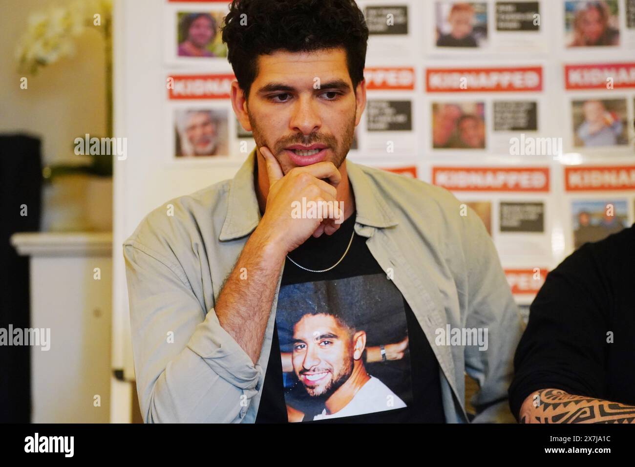 Ilay David, brother of hostage Evyatar David, speaking at the Embassy ...