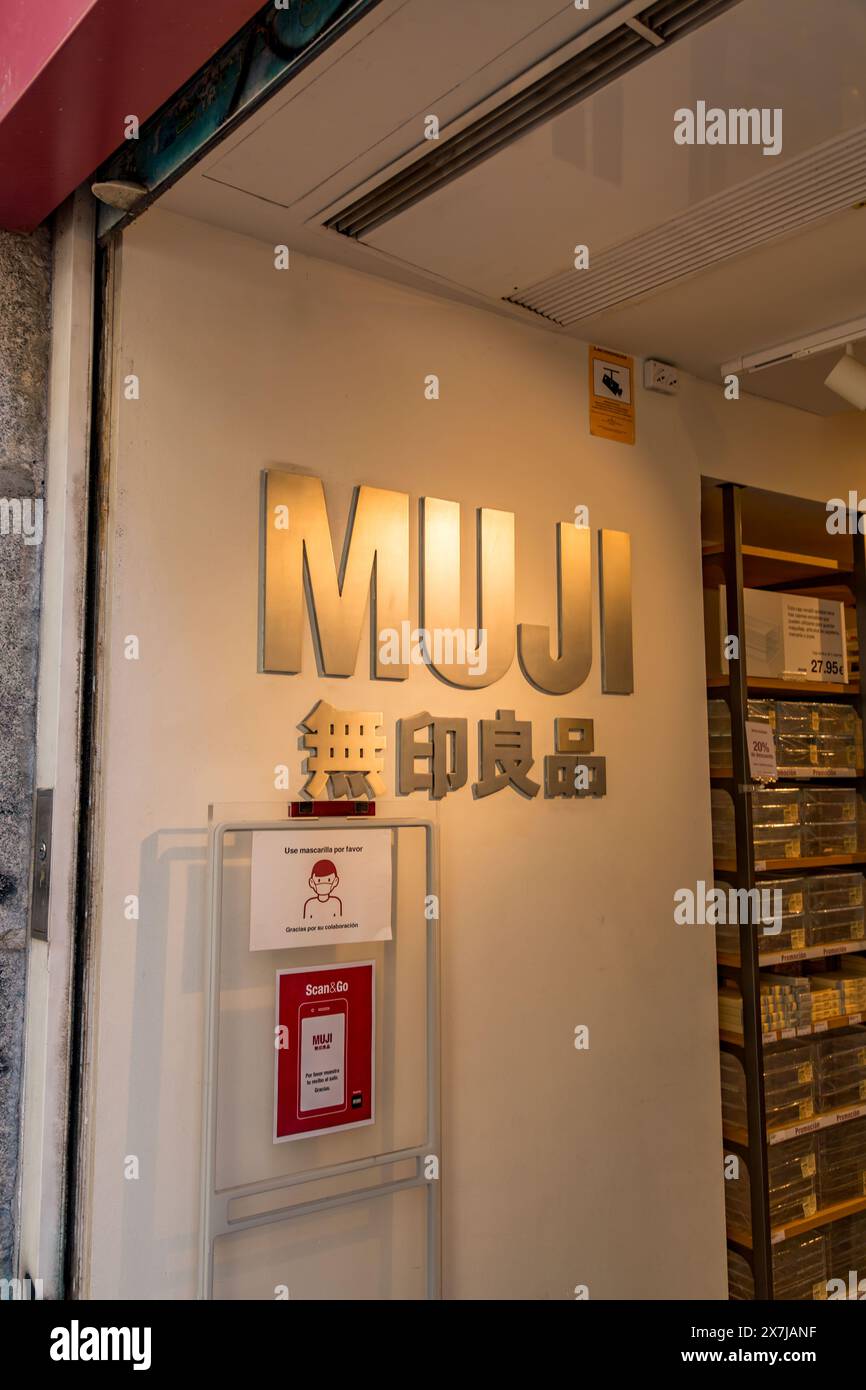 Madrid, Spain - FEB 16, 2022: Logo sign at the entrance of Muji store ...